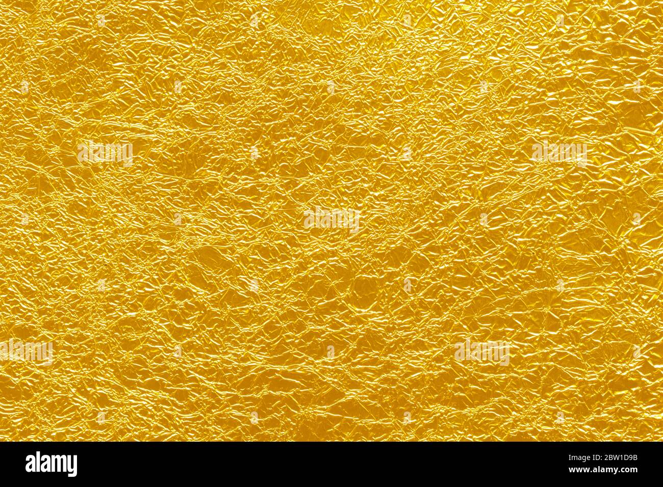 Gold foil abstract background texture Stock Photo - Alamy