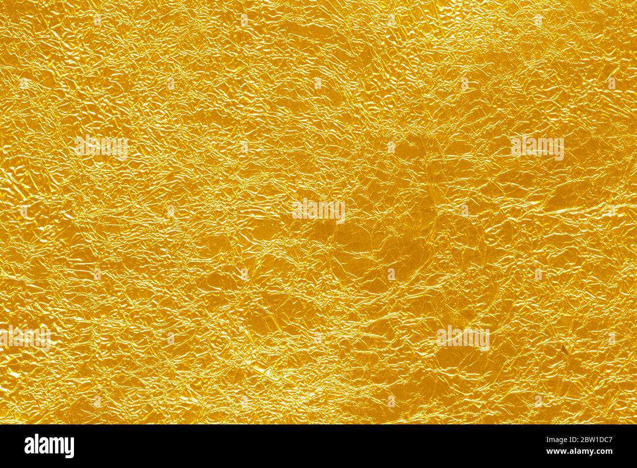 Gold foil abstract background texture Stock Photo - Alamy