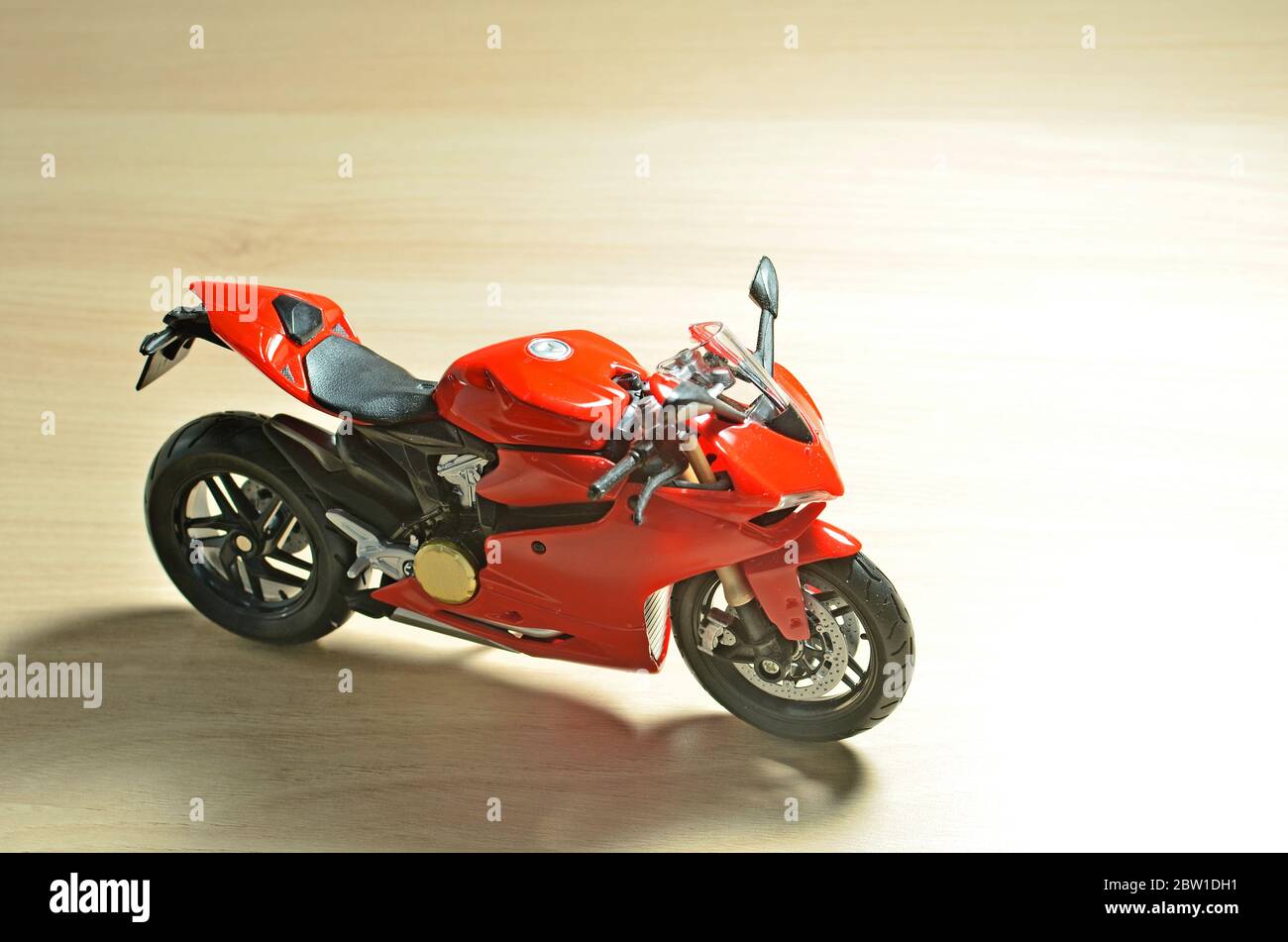 Red motorcycle toy in with background Stock Photo - Alamy