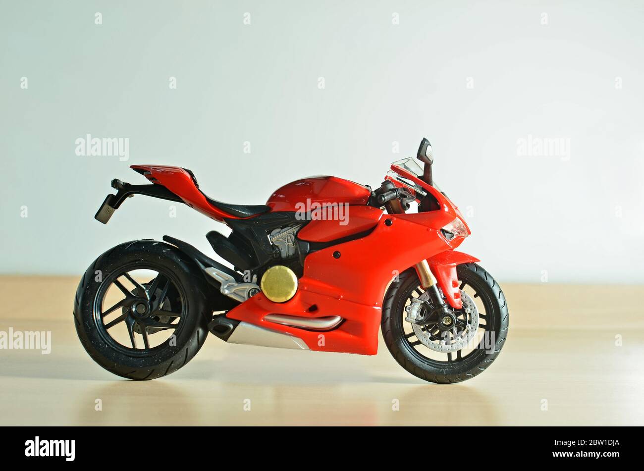 Red motorcycle toy in with background Stock Photo - Alamy