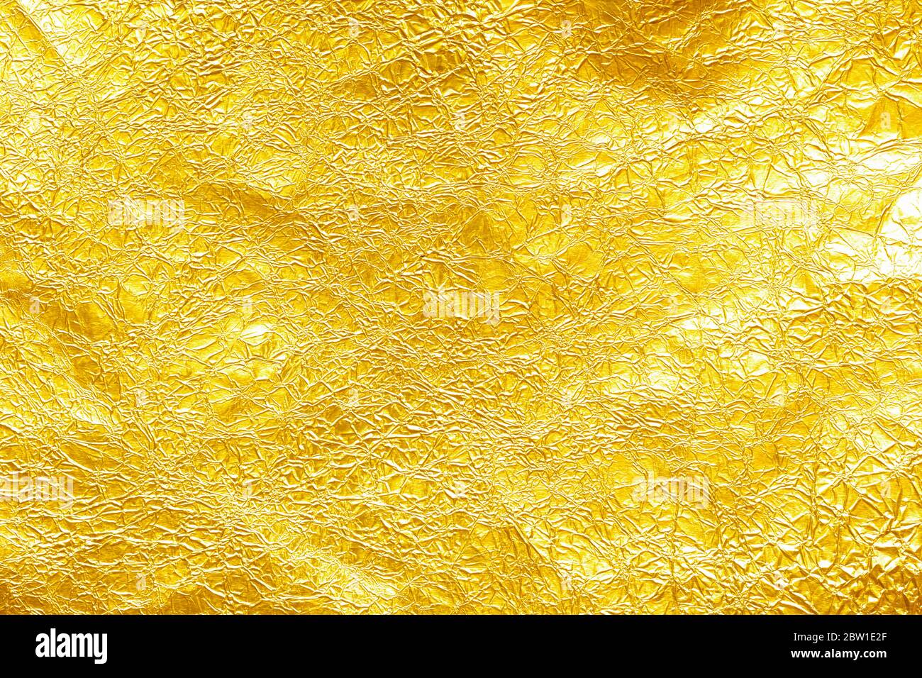 Gold foil abstract background texture Stock Photo - Alamy