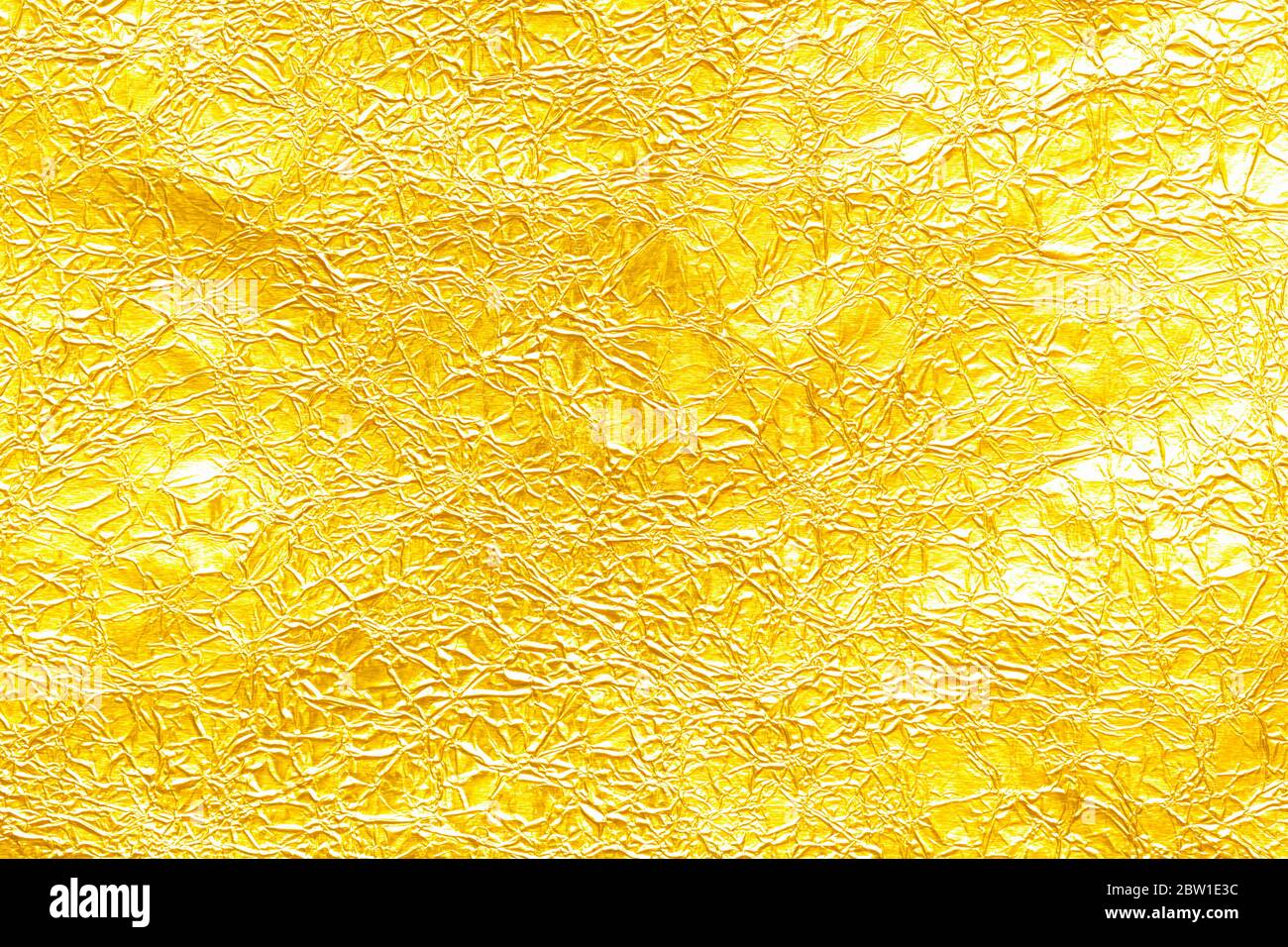 Gold foil abstract background texture Stock Photo - Alamy