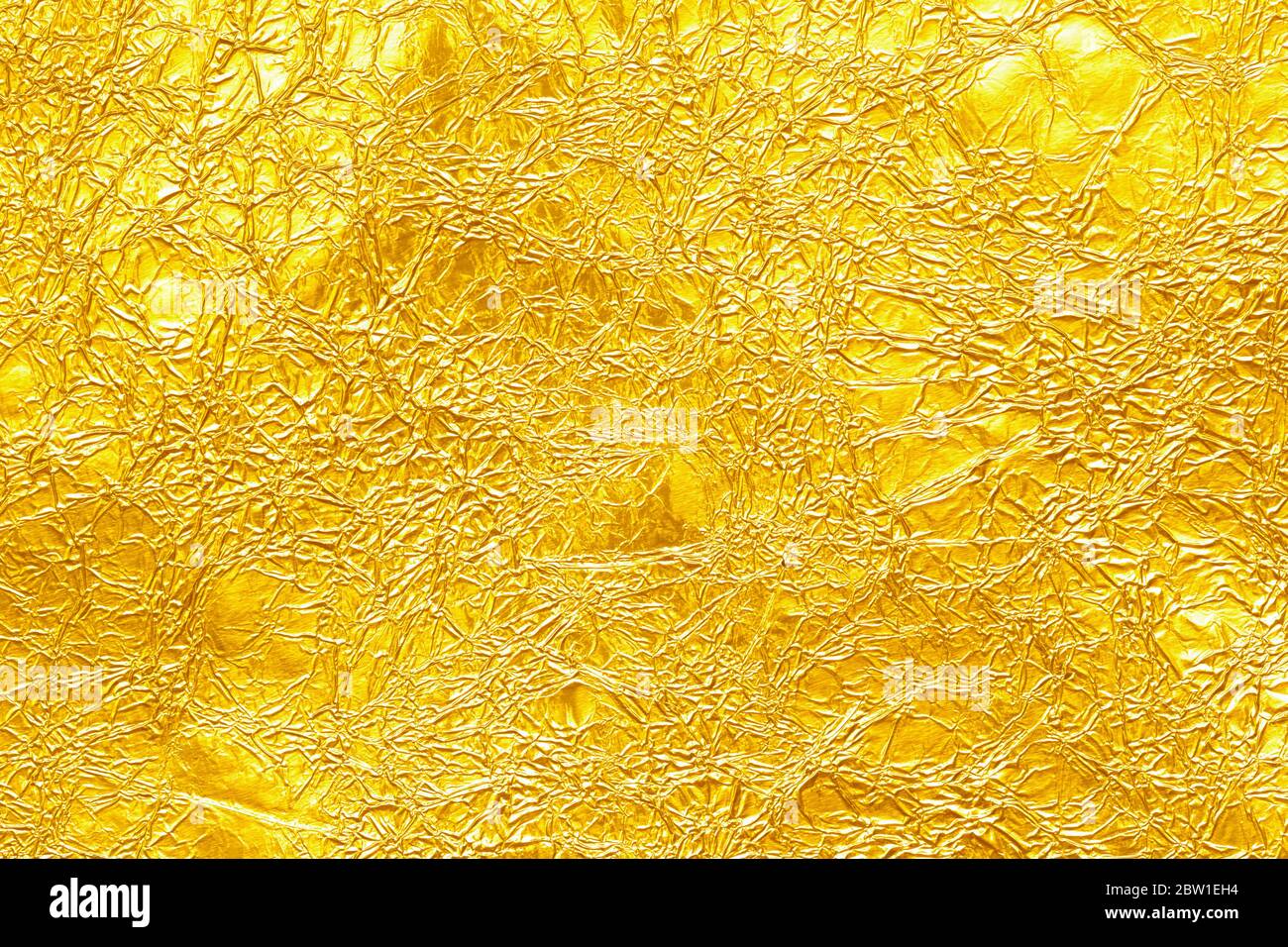Gold foil abstract background texture Stock Photo - Alamy