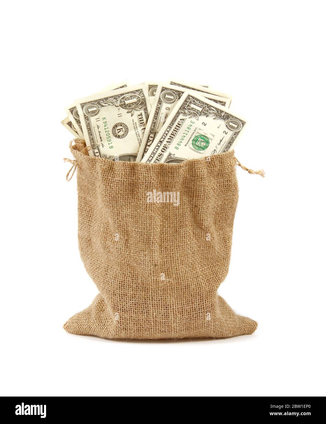 Money in the bag isolated on a white background Stock Photo - Alamy