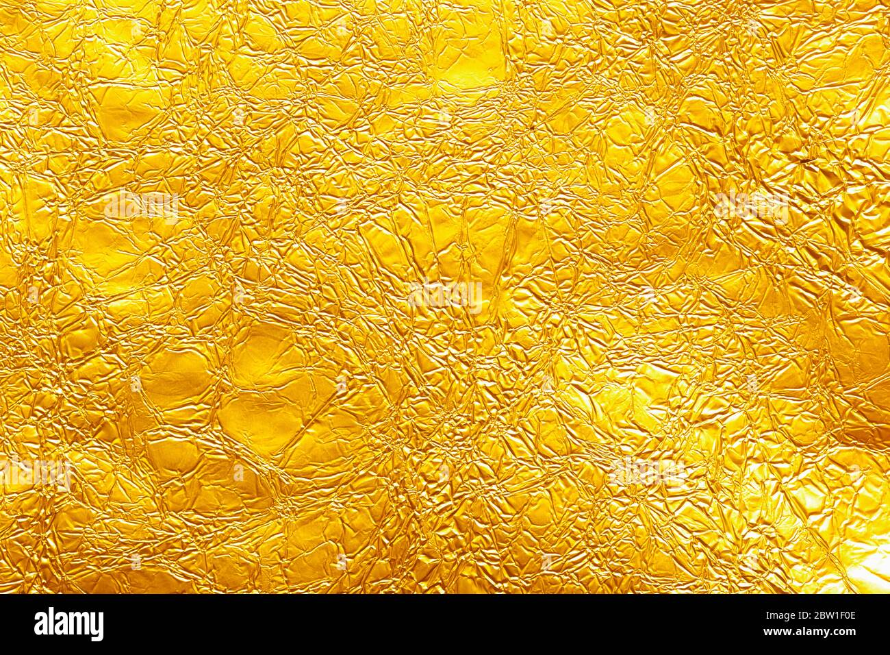Gold foil abstract background texture Stock Photo - Alamy
