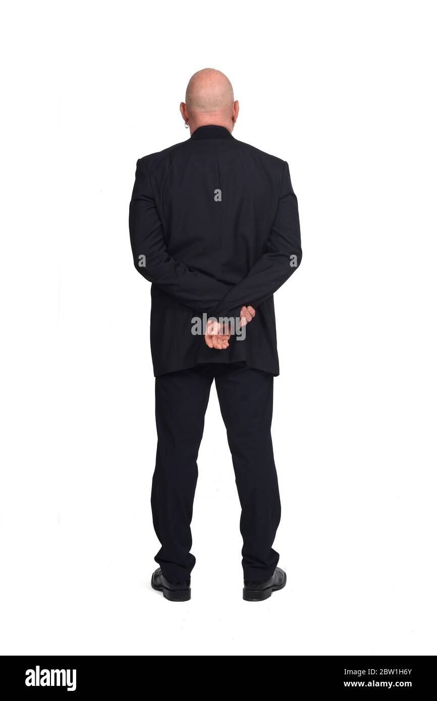full portrait of a man from behind on white background, hands crossed ...