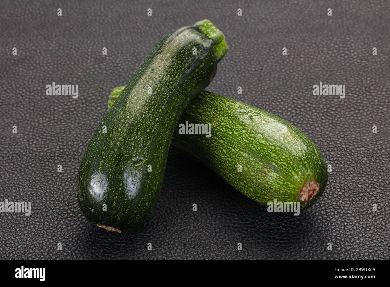 Raw ripe zucchini ready for cooking Stock Photo - Alamy