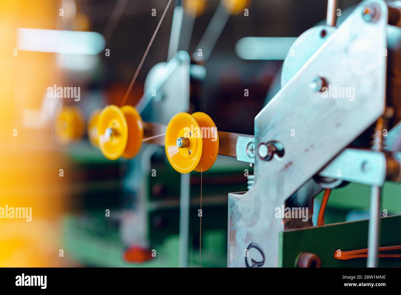 Cable production. Close up of a cable reel Stock Photo - Alamy