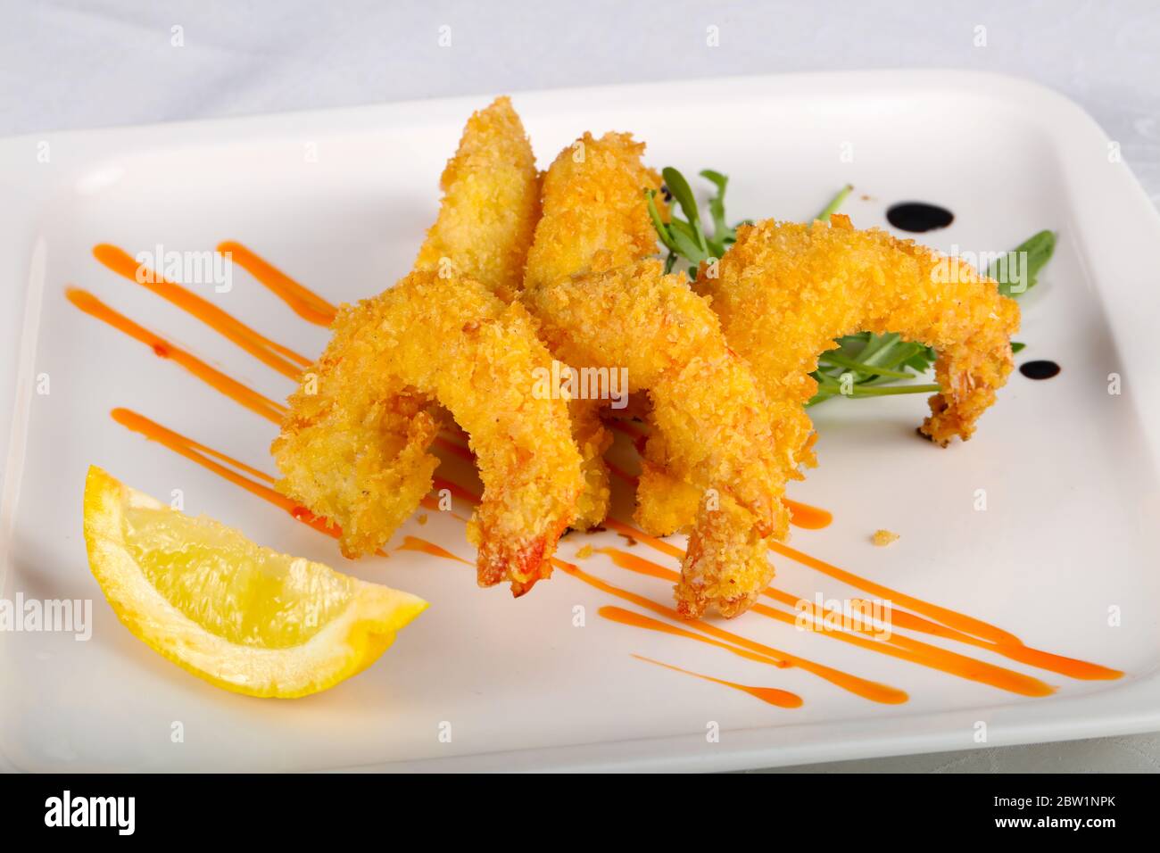 Crispy prawns served lemon slice Stock Photo - Alamy