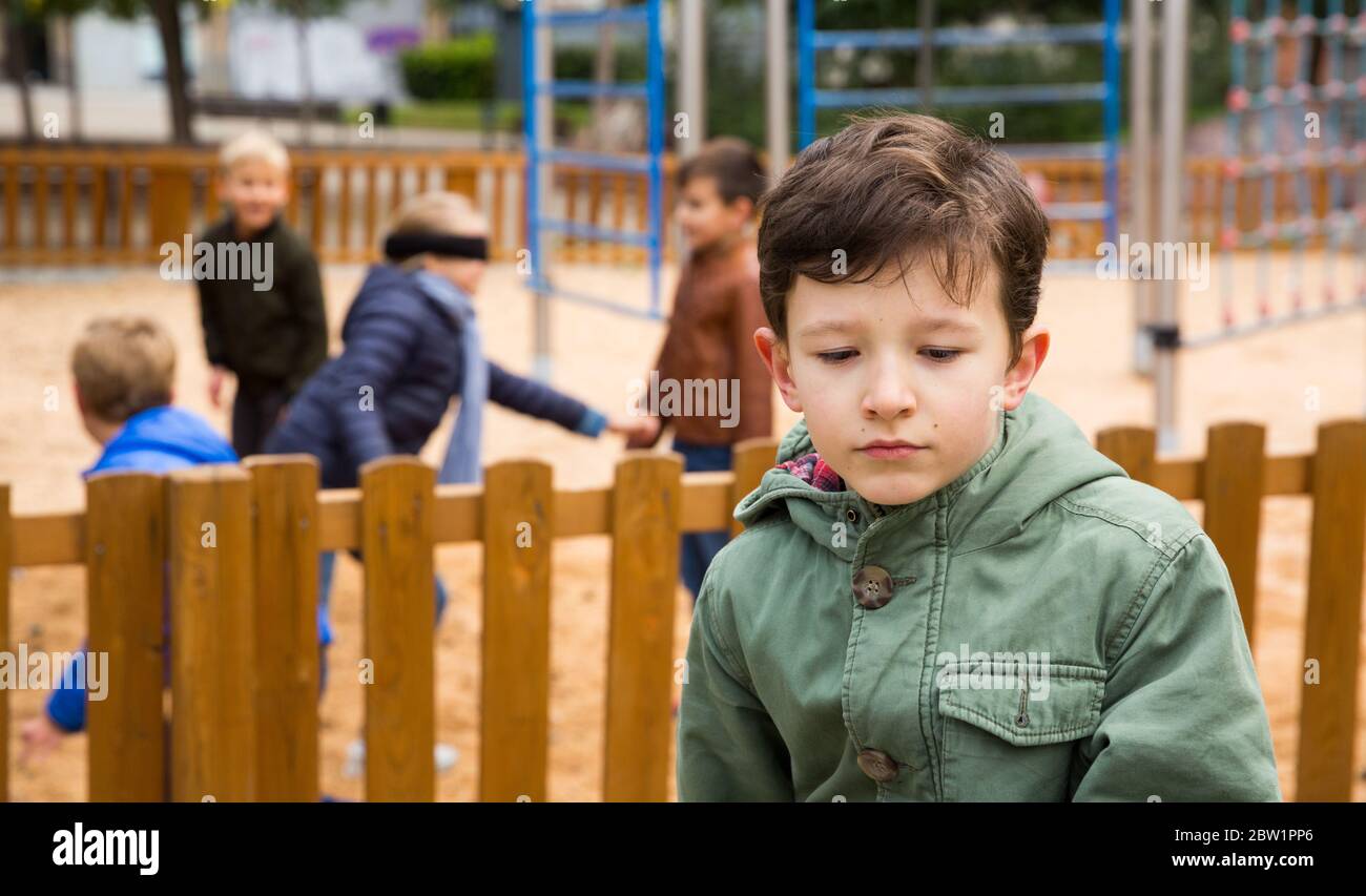 Boy upset playground hi-res stock photography and images - Alamy