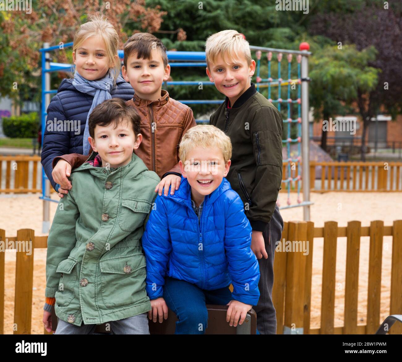 Group portrait of cheerful children having fun together outdoors Stock ...