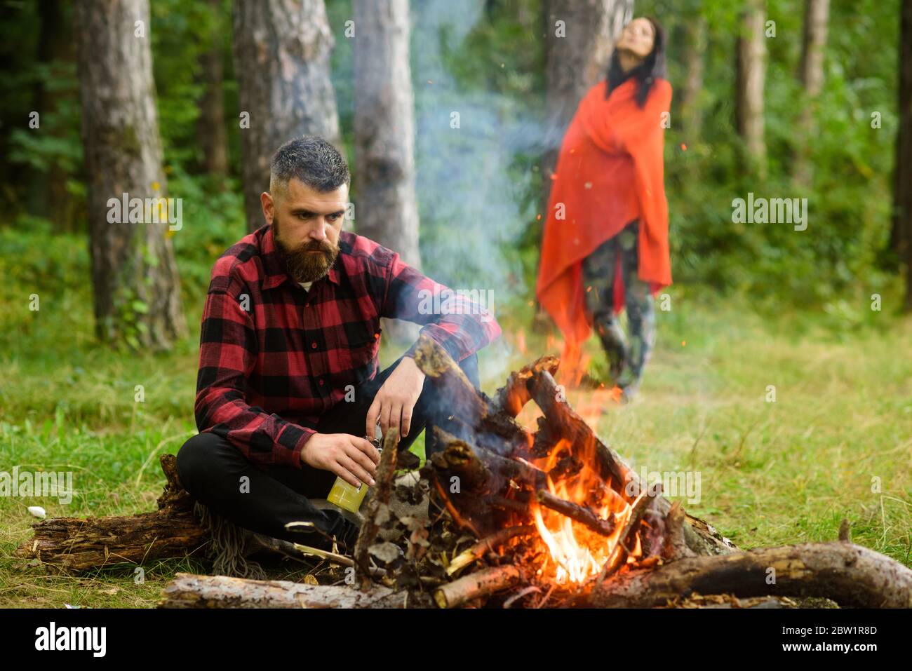 Guy with tired face and lonely at picnic, barbecue with girlfriend on ...