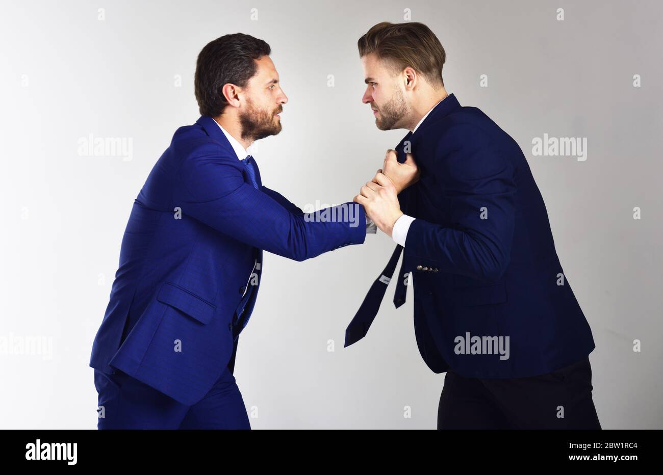 People fighting in business suits hi-res stock photography and images ...