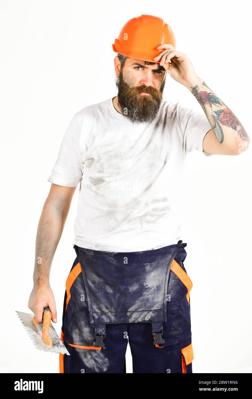 Plasterer, repairman, foreman takes off helmet or hard hat. End of ...