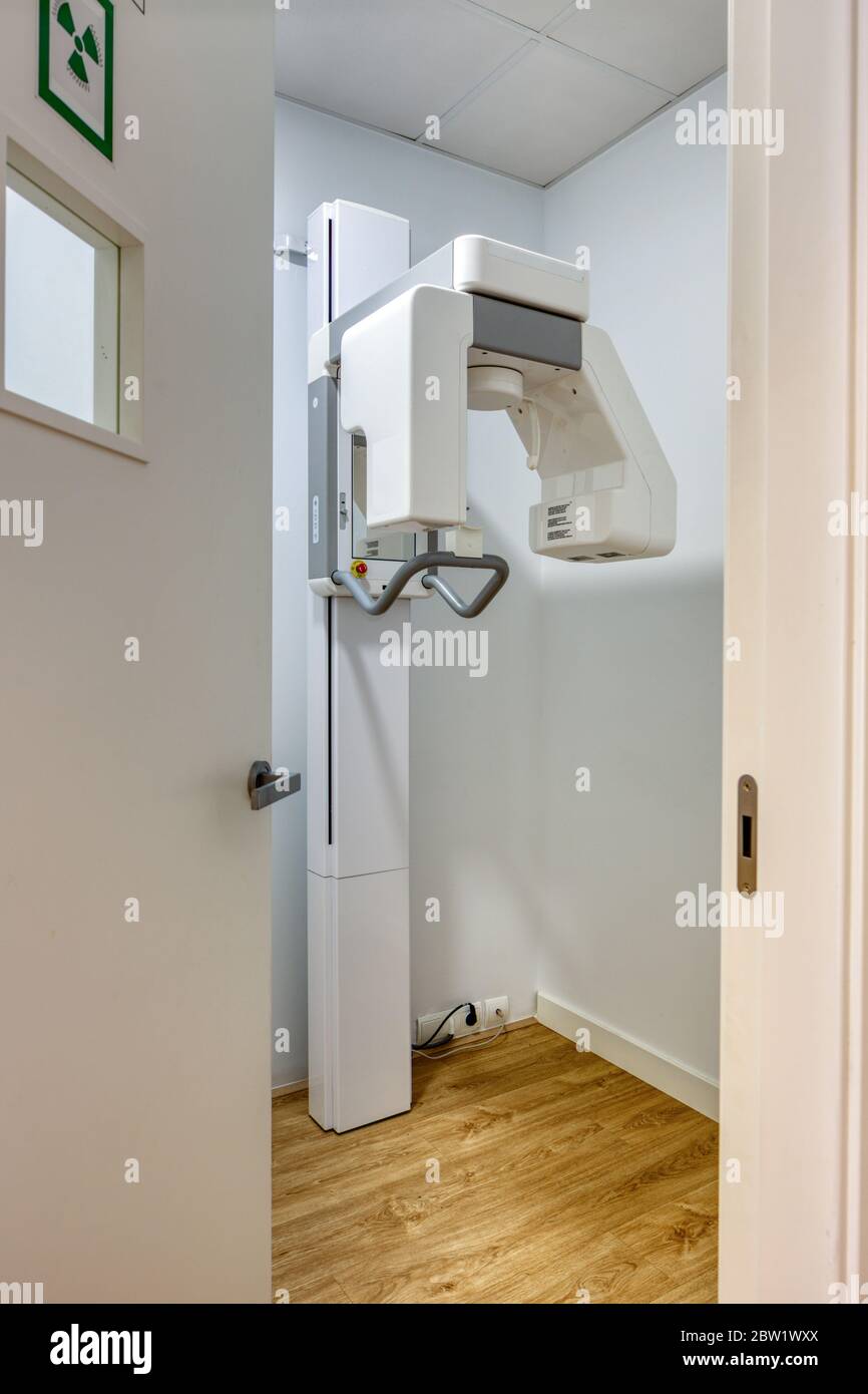 X-ray cabin in modern and current dental clinic with white walls and ...