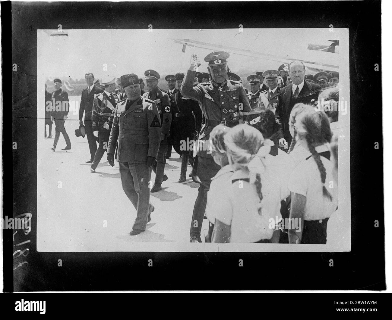 German War Minister salutes schoolgirls with pigtails in Rome. Field ...
