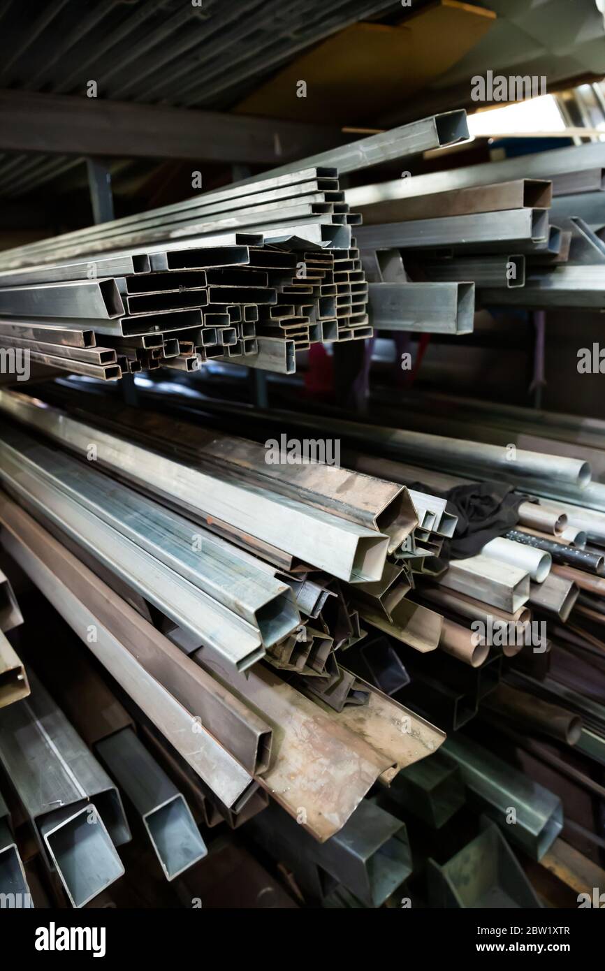 Stack of different metal pipes Stock Photo - Alamy