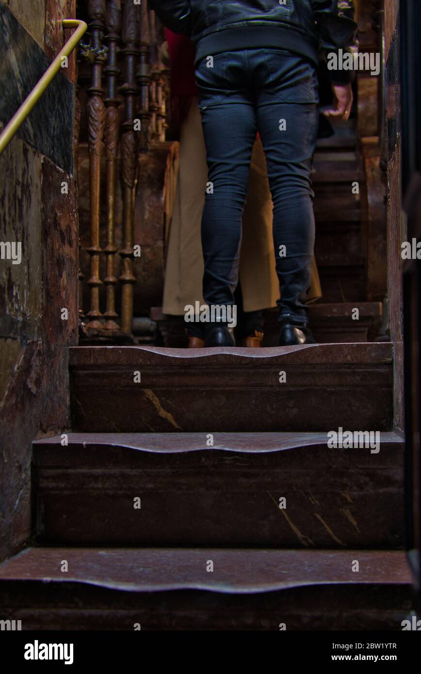 Marble stone steps worn by the passage of parishioners in the cathedral ...
