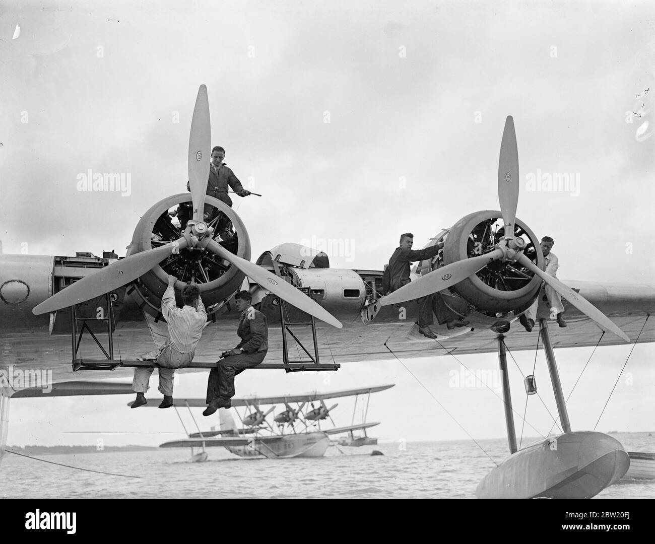The Empire flying-boat Caledonia is being prepared at Southampton for ...