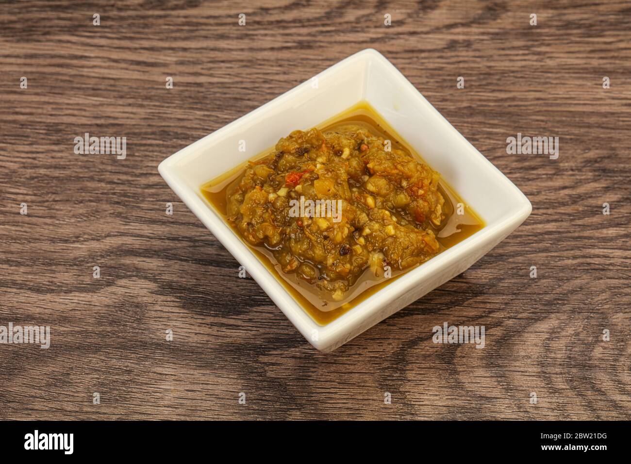 Green spicy sauce with pepper in the bowl Stock Photo - Alamy