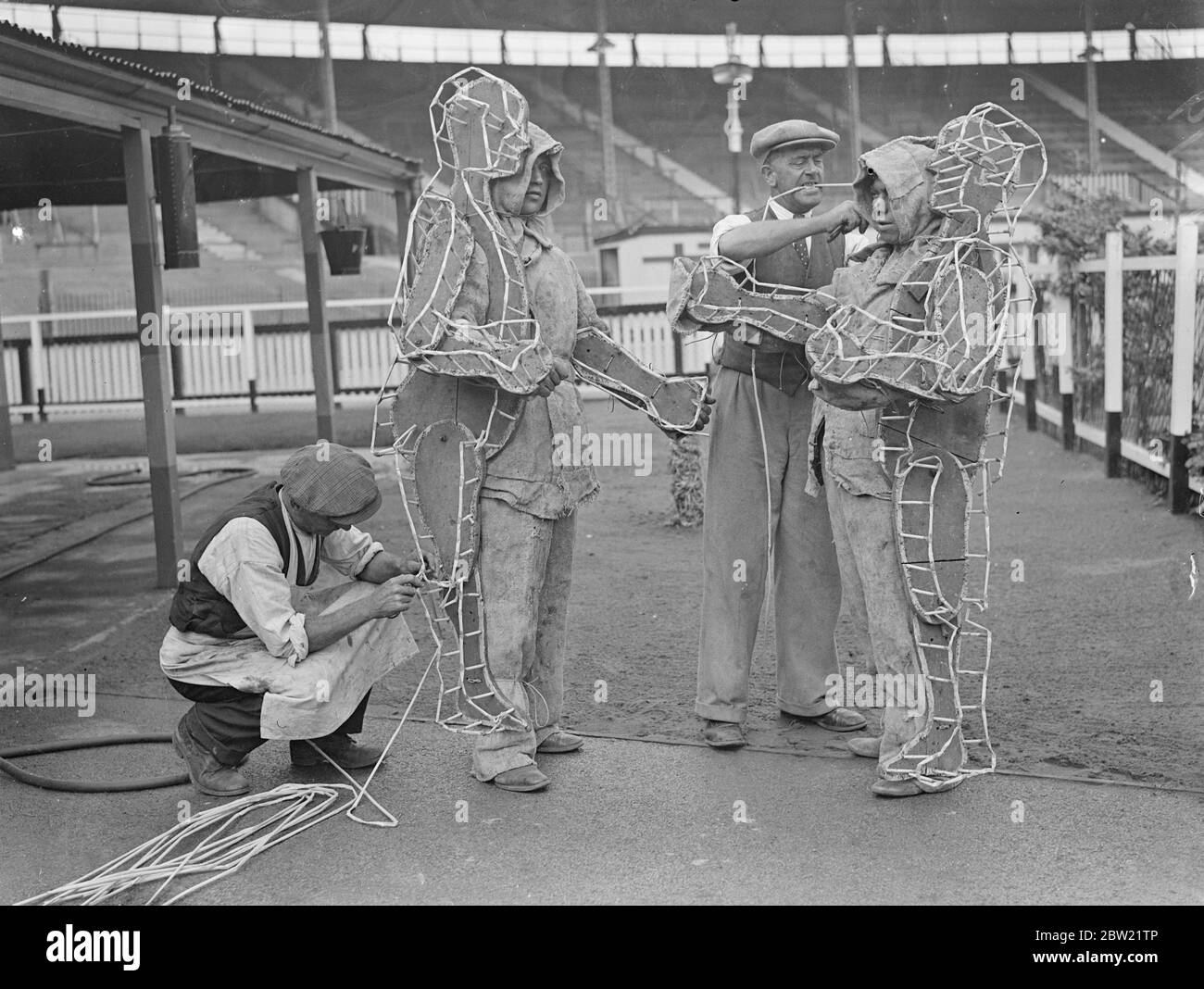 The human fireworks, wearing their heavy asbestos suits studded with ...