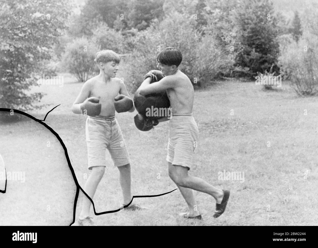 Young King Peter of Yugoslavia boxing with his cousin Prince Alexandra ...
