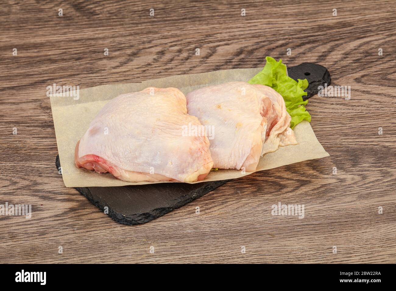 Raw chicken hip ready for cooking Stock Photo - Alamy