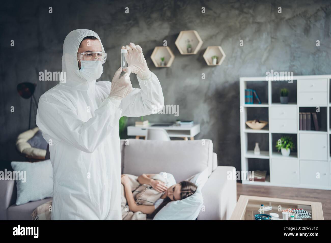 Photo of young sick patient lady lying sofa unwell call ambulance guy ...