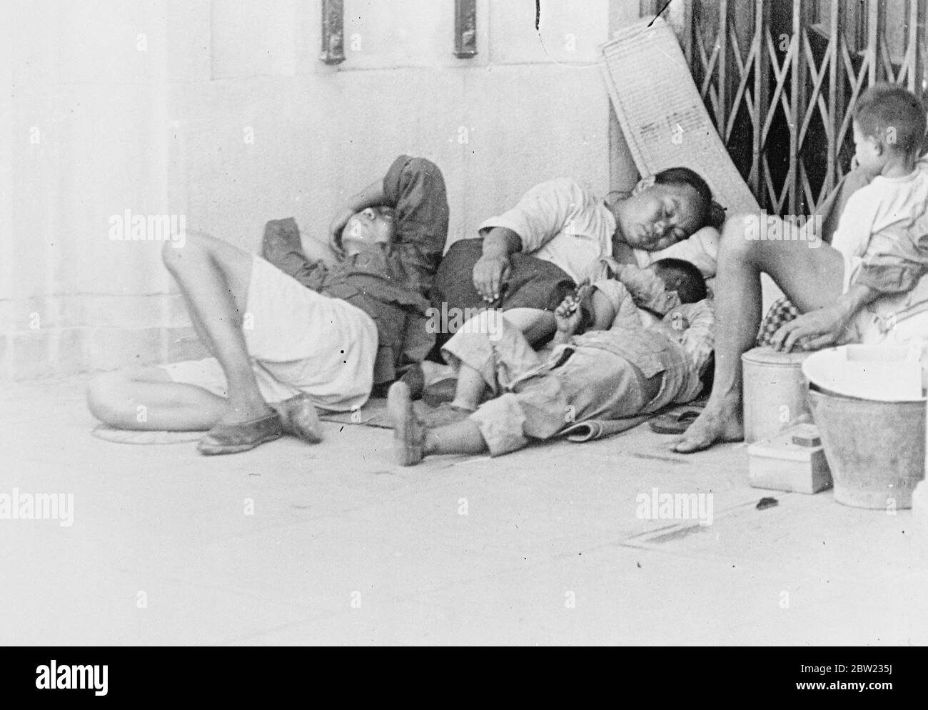 Homeless chinese family Black and White Stock Photos & Images - Alamy