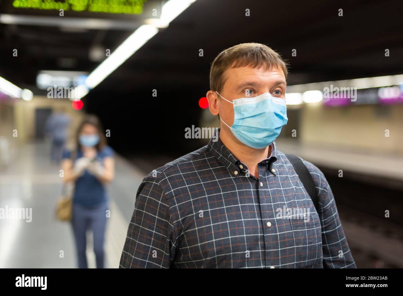 Portrait of male passenger in disposable face mask and latex gloves ...
