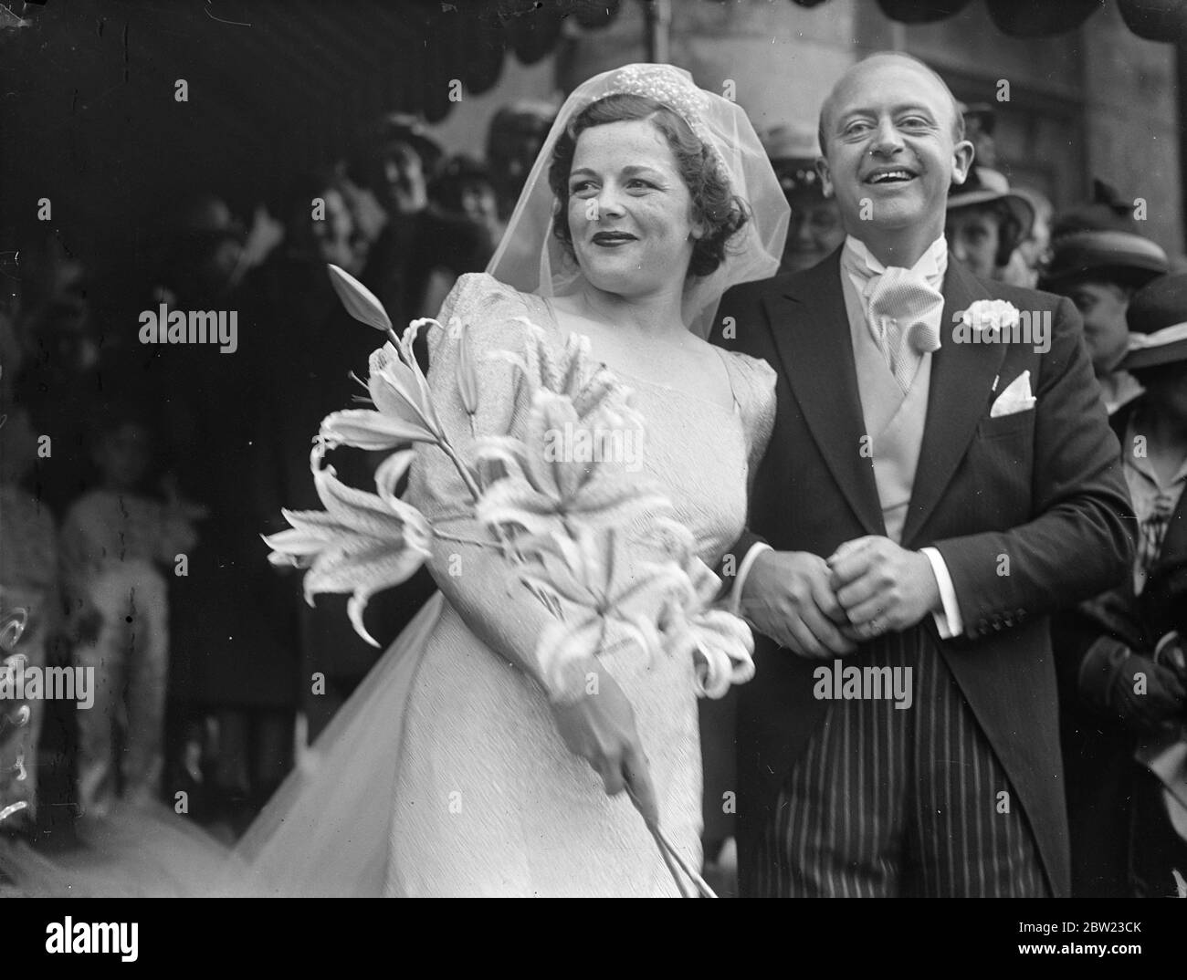 Miss Daphne Kingsmill and Mr John Purbeck smiling as they left the ...