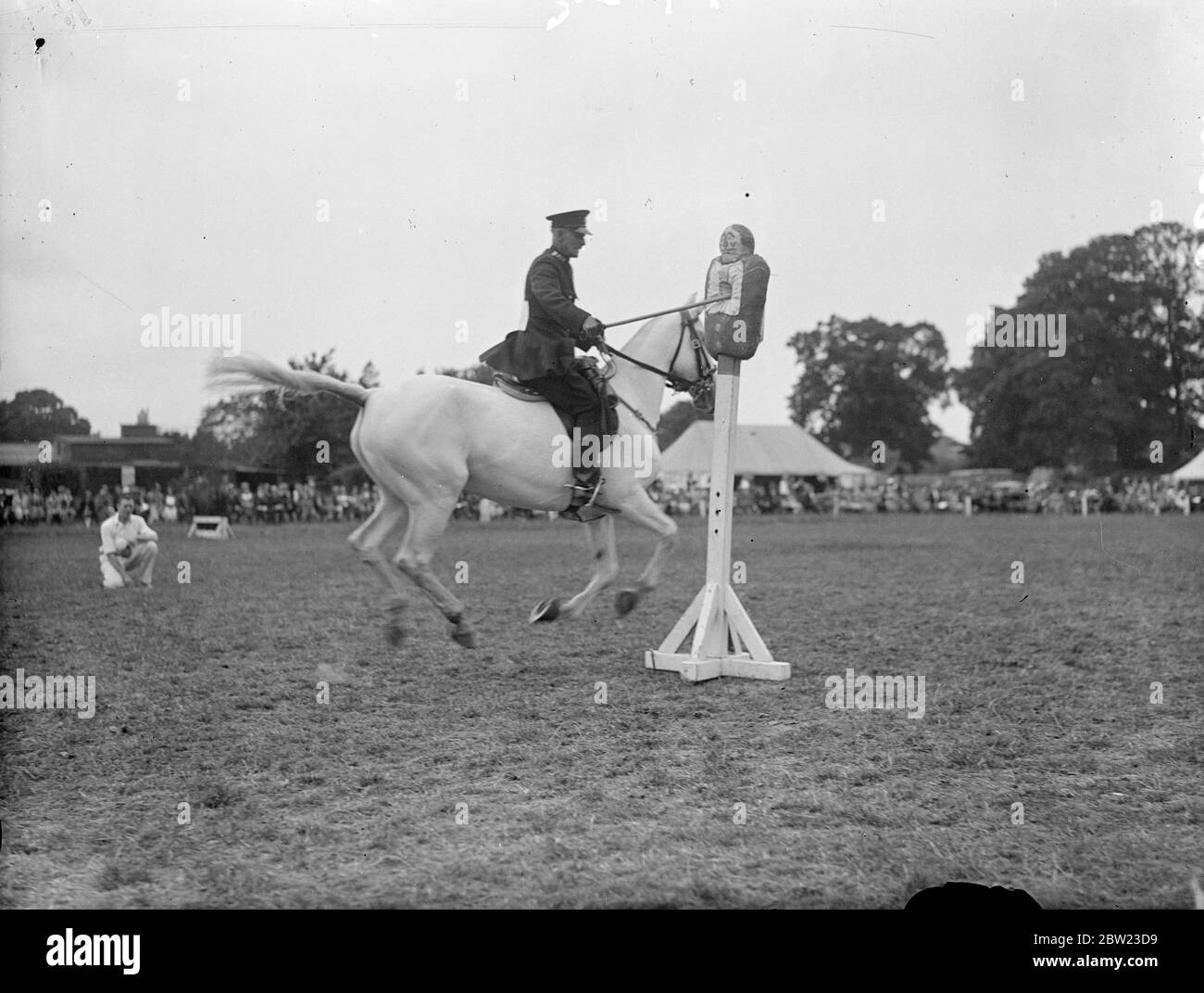 A mounted policeman competing in the' truncheon ' event at the ...