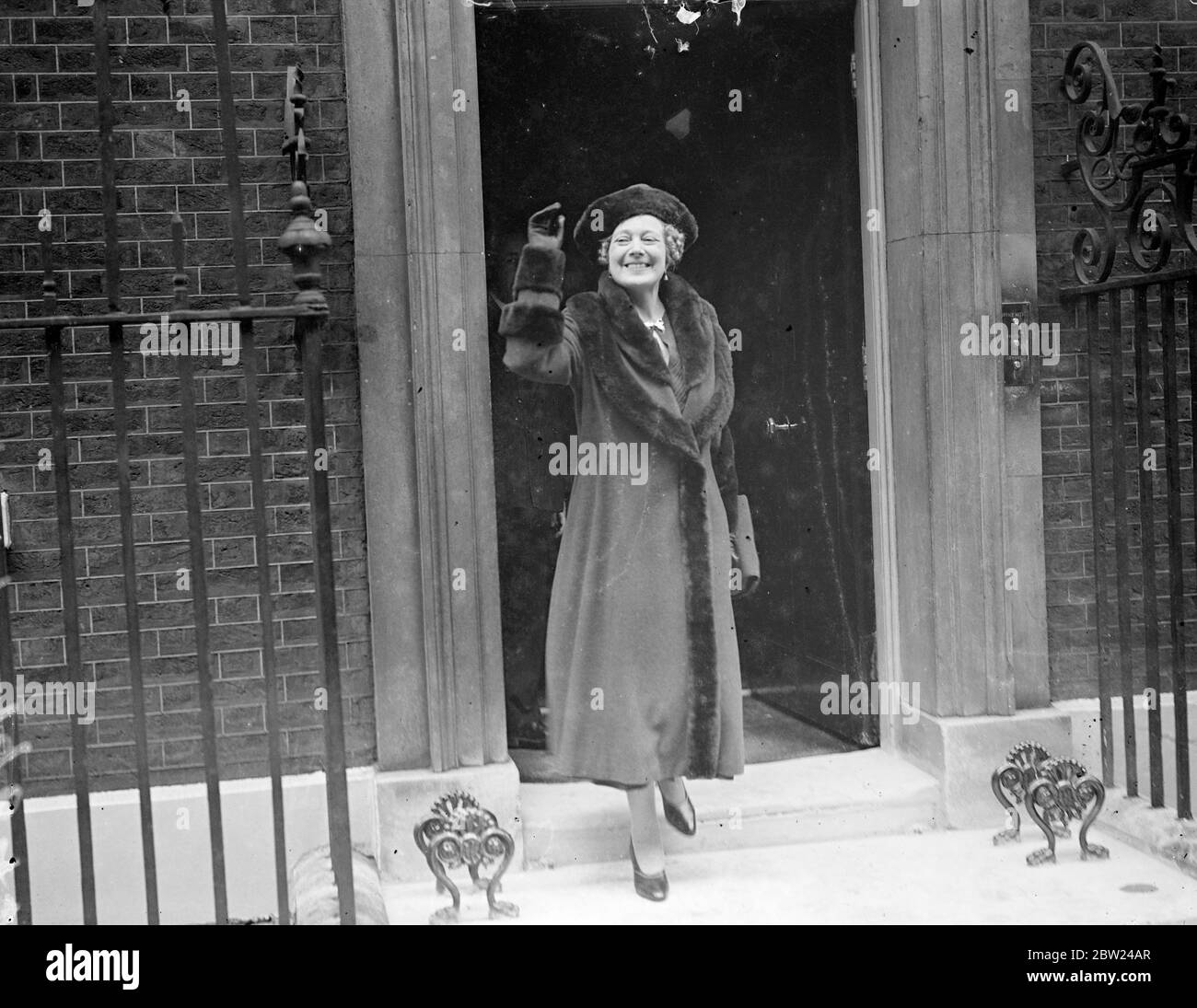 Mrs Chamberlain waves cheering crowds in Downing Street. Mrs ...