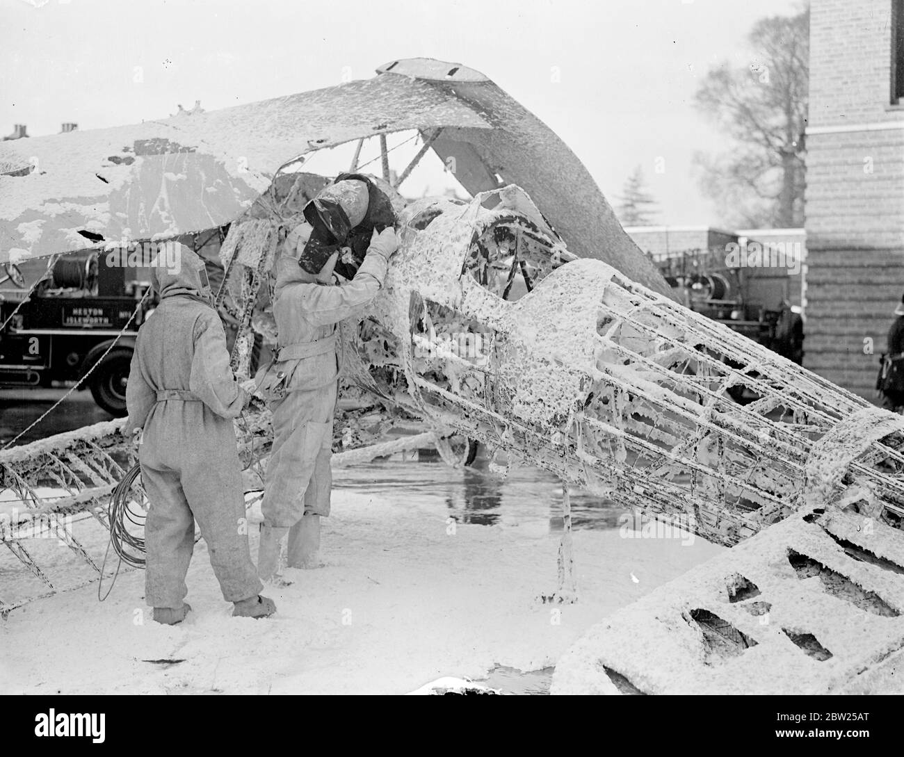 Heston firemen rescue pilot from blazing plane. Heston and Isleworth ...