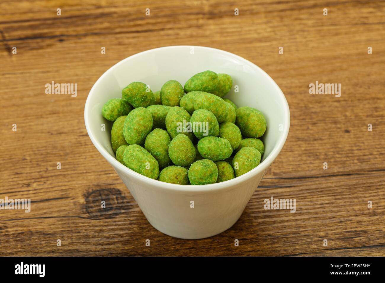 Spicy wasabi peanuts snack in the bowl Stock Photo - Alamy