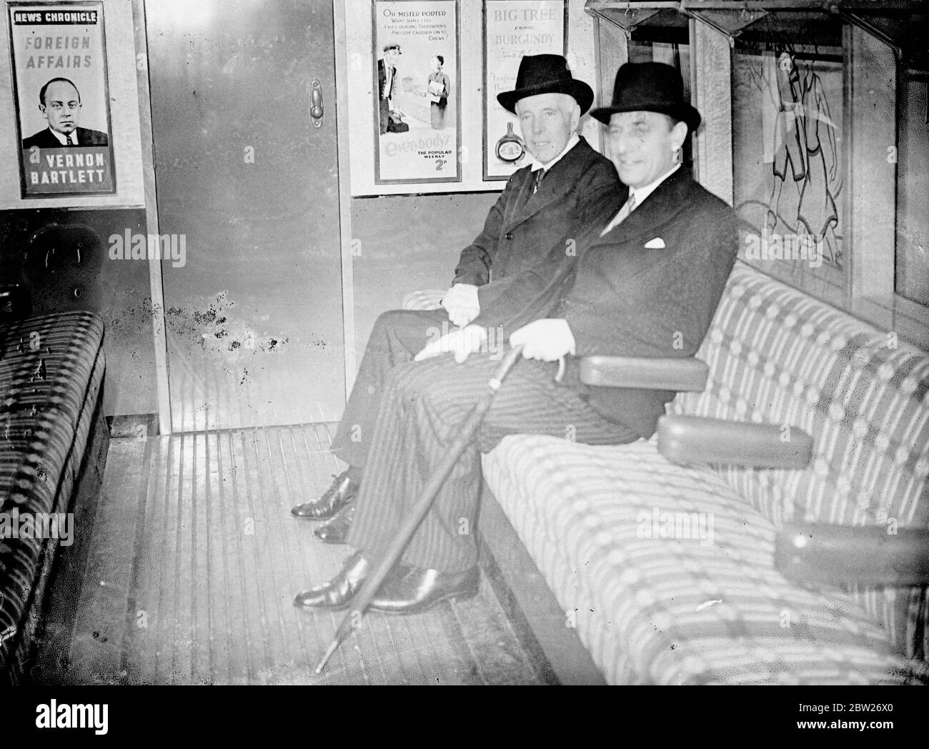 Transport minister and Lord Ashfield try new underground train. The ...