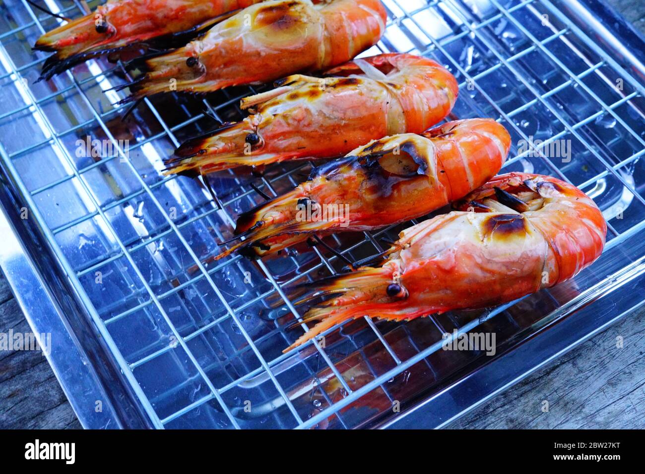 Grilled shrimp (Giant freshwater River prawn) grilling with charcoal at ...