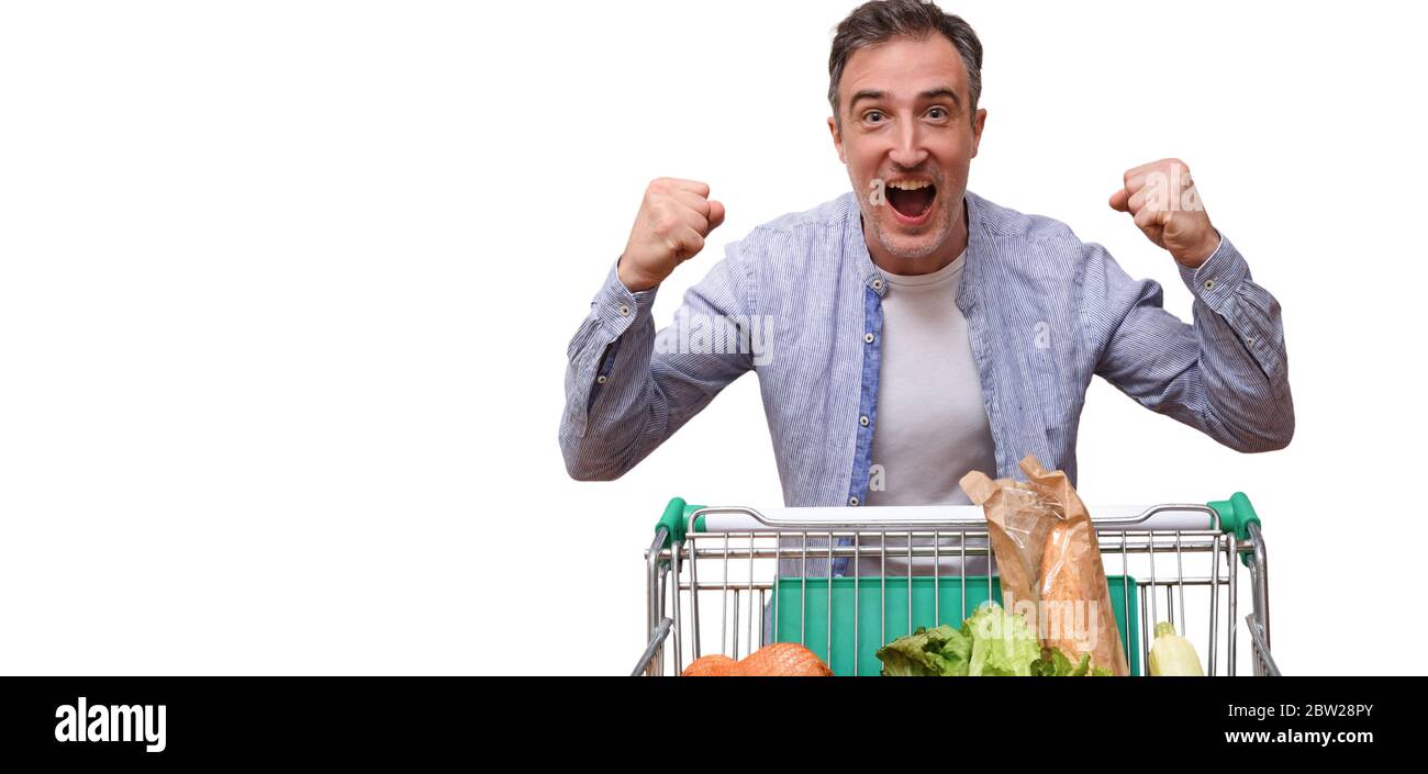 Happy supermarket customer raising hands with clenched fists with ...