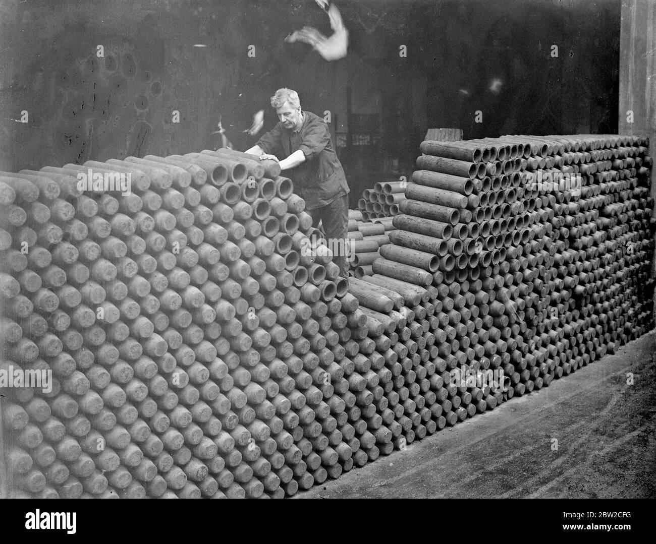 A wall of shells. Thousands of shells in course of manufacture stacked ...