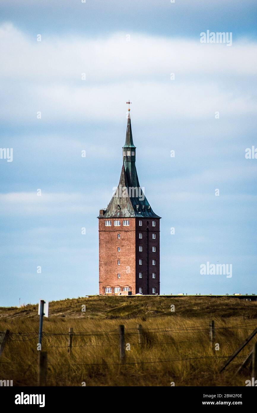 Square lighthouse on an island Stock Photo - Alamy