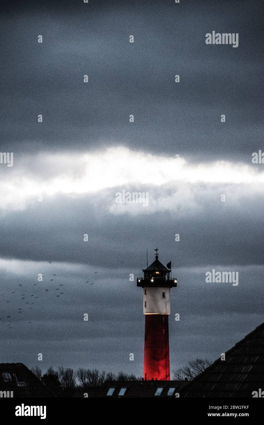 red lighthouse on wangerooge island Stock Photo - Alamy