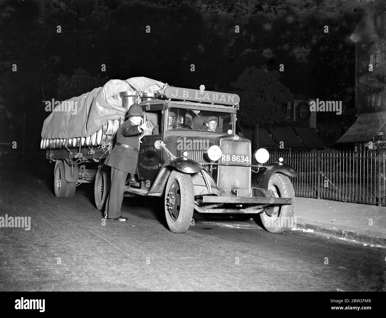 Bedford, Night series. Police giving direction. 1934 Stock Photo - Alamy