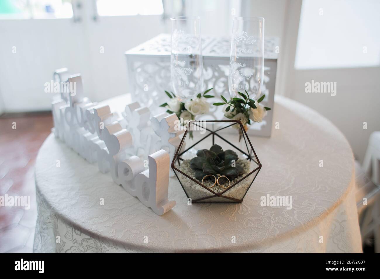 wedding rings in transparent box Stock Photo - Alamy