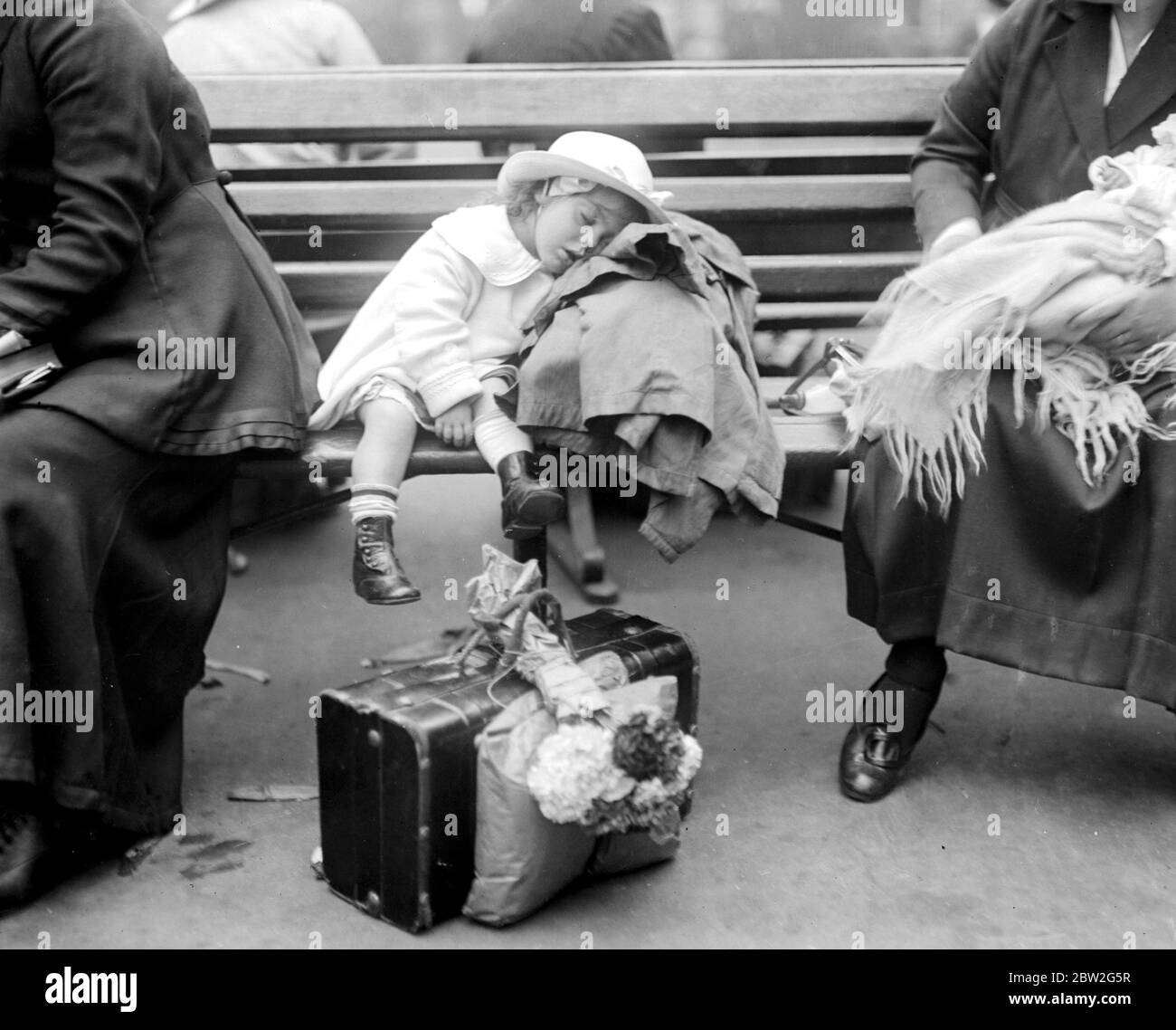 Tired out before the start at Waterloo. 1 July 1920 Stock Photo - Alamy