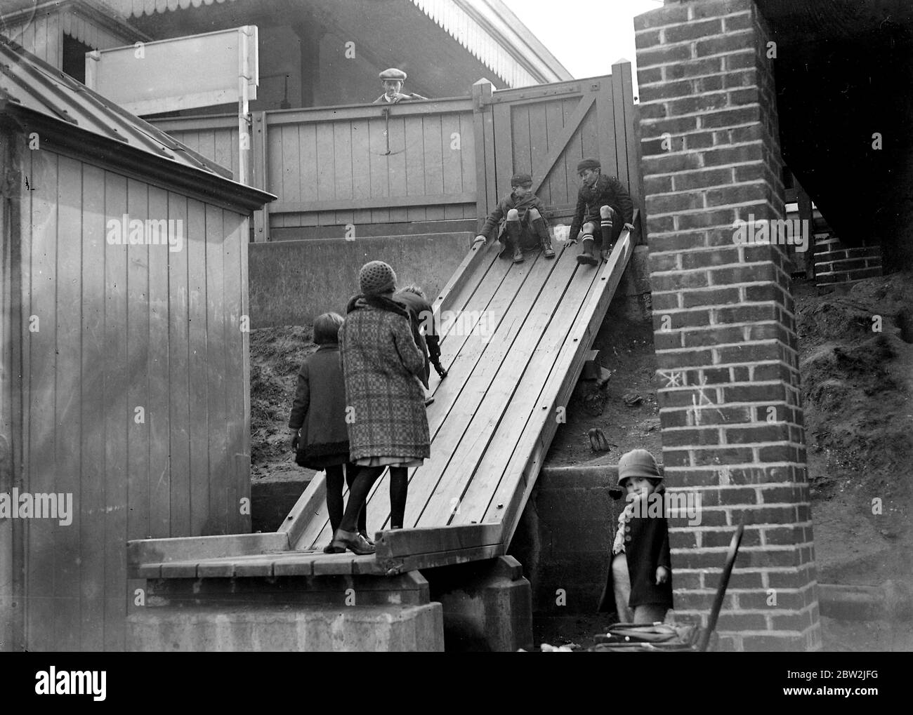 White and black children playing hi-res stock photography and images ...
