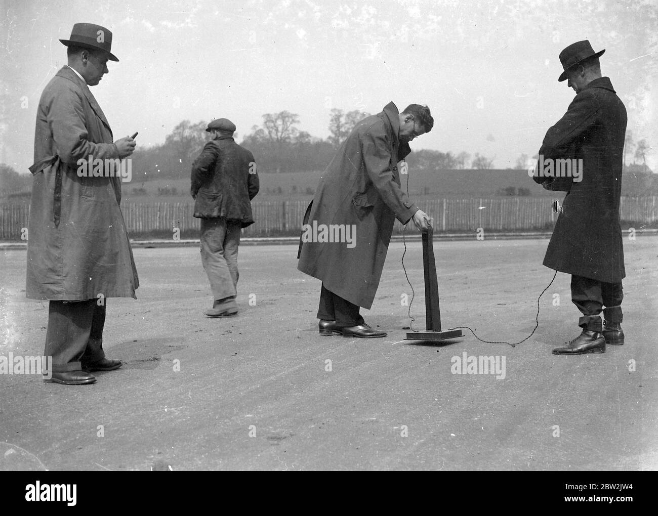 Electric magnet searching, divining metal. 1934 Stock Photo - Alamy