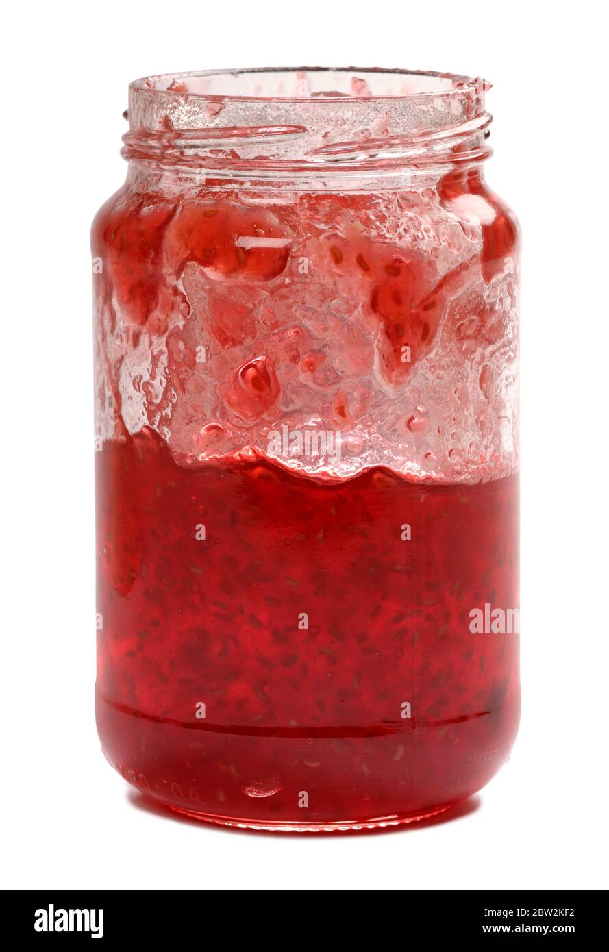 Half a jar of home made raspberry jam Stock Photo - Alamy