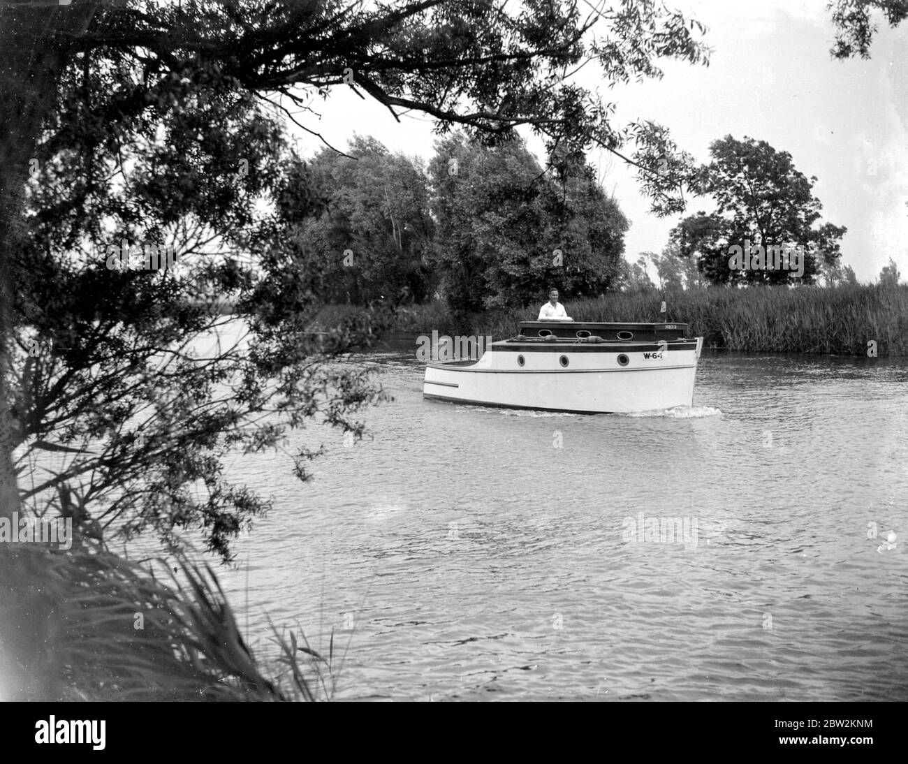 Motor Cruise on The Broads in Norfolk. 1933 Stock Photo - Alamy