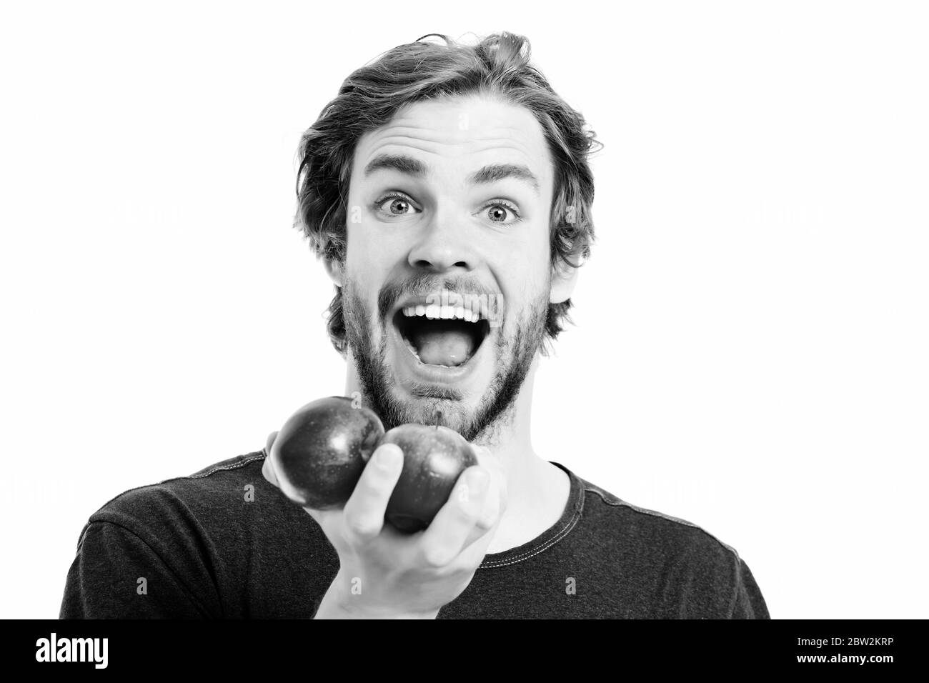 Hand holding apple Black and White Stock Photos & Images - Alamy