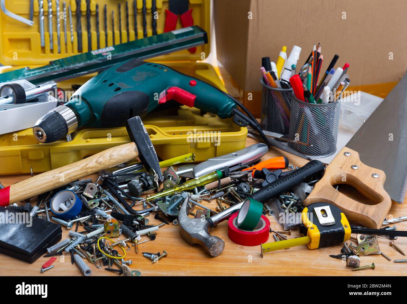 Table littered with various construction tools Stock Photo - Alamy